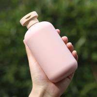China Macaron-colored Cosmetic Empty Bottle 100~500ml Refillable Cosmetic Bottles with Pump or Flip Top Cap for sale