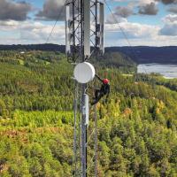 China Guyed Wire Tower featuring design compliance with ANSI/TIA-222-G-H-F and European EN standards for structural performance for sale