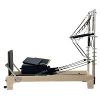 China Maple Wood Power Pilates Tower Machine Reformer Machine Adjustable Springs for sale