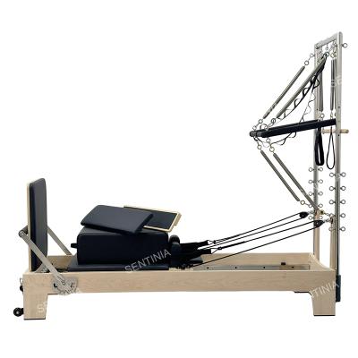 China Maple Wood Power Pilates Tower Machine Reformer Machine Adjustable Springs for sale