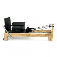 China Commercial Rubber Wooden Pilates Reformer Machine For Workout OEM for sale