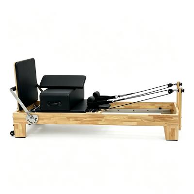 China Commercial Rubber Wooden Pilates Reformer Machine For Workout OEM for sale