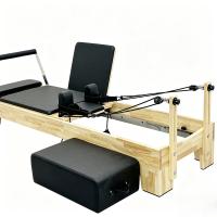 China Commercial Rubber Wooden Pilates Reformer Machine For Workout OEM for sale