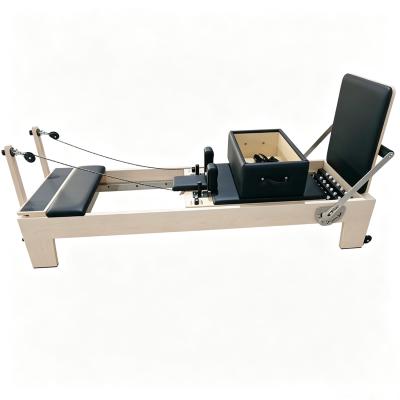 China Folding Maple Wooden Pilates Reformer Machine For Commercial Studios for sale
