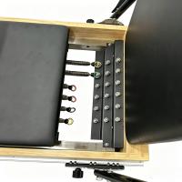 China Custom Rubber Wood Foldable Wooden Pilates Reformer Machine Full Track For Professional Studios for sale