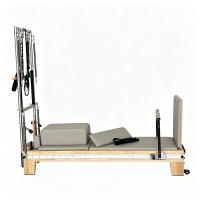China Rubberwood Tower Body Pilates Reformer Machine For Beginners Movable Footbar for sale