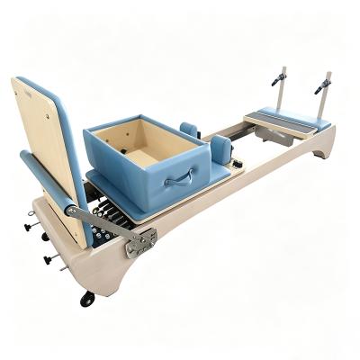 China Maple Wood Studio Pilates Reformer Machine Boat Shaped For Beginners Customizable for sale