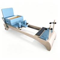China Maple Wood Studio Pilates Reformer Machine Boat Shaped For Beginners Customizable for sale
