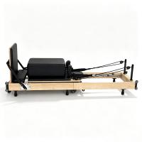 China Rubber Wood Foldable Pilates Reformer Equipment Adjustable Footbar For Home Studio Fitness for sale