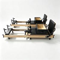 China Rubber Wood Foldable Pilates Reformer Equipment Adjustable Footbar For Home Studio Fitness for sale