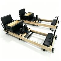 China Rubber Wood Foldable Pilates Reformer Equipment Adjustable Footbar For Home Studio Fitness for sale