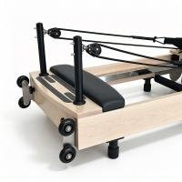 China Compact Folding Pilates Machine Reformer Microfiber Leather Upholstery Customized for sale