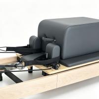 China Compact Folding Pilates Machine Reformer Microfiber Leather Upholstery Customized for sale
