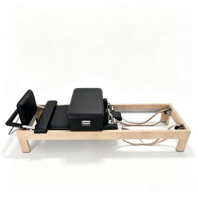 China Classic Traditional Maple Wooden Reformer Pilates Exercise Machine With Germany Spring for sale