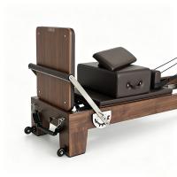 China Compact Solid Walnut Wood Wooden Pilates Reformer Bed Equipment For Rehabilitation Gym Training for sale