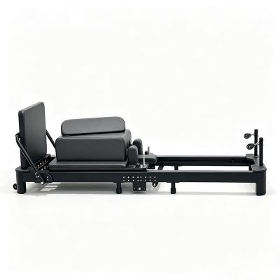 China Commercial Aluminum Foldable Pilates Reformer For Weight Loss All Black OEM for sale