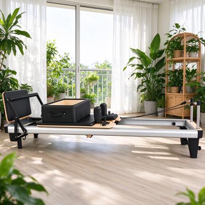 China Fixed Microfiber Leather Studio Pilates Reformer Machine For Workout 90kg for sale