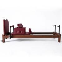 China Clinical Walnut Pilates Performer Machine With 6 Piano Wire Springs ODM for sale