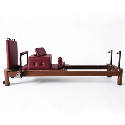 China Clinical Walnut Pilates Performer Machine With 6 Piano Wire Springs ODM for sale