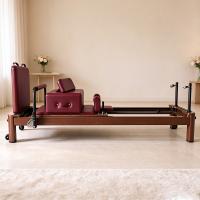 China Woodgrain Aluminum Pilates Reformer Machine Transformer 75kg Custom for sale