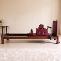 China Woodgrain Aluminum Pilates Reformer Machine Transformer 75kg Custom for sale