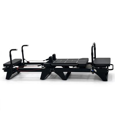 China Luxury Supermodel Mega Studio Pilates Reformer Machine Carbon Fiber Microfiber Leather for sale