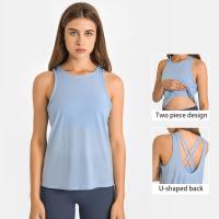 China Active Stretch Ladies Yoga Tops One Piece Two Wear Cross Open Back Sport Bra With Removable Pad for sale