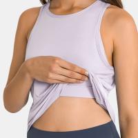 China Active Stretch Ladies Yoga Tops One Piece Two Wear Cross Open Back Sport Bra With Removable Pad for sale