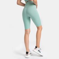 China Anti UV Ladies Yoga Sports Shorts Leggings Running Pants With Waistband Pocket for sale