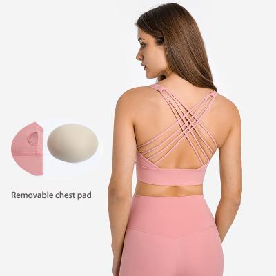 China Women's Medium Support Cross Back Sports Bra Removable Cups Yoga Bra for sale