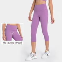 China 10 Colors High Waist Hip Lifting Pocket Yoga Sports Pants Nylon Nude Athletic Leggings for sale
