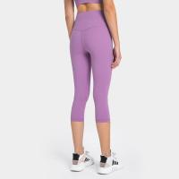 China 10 Colors High Waist Hip Lifting Pocket Yoga Sports Pants Nylon Nude Athletic Leggings for sale