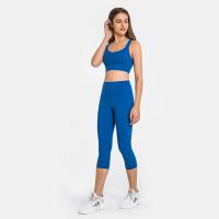 China 10 Colors High Waist Hip Lifting Pocket Yoga Sports Pants Nylon Nude Athletic Leggings for sale
