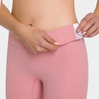 China 10 Colors High Waist Hip Lifting Pocket Yoga Sports Pants Nylon Nude Athletic Leggings for sale