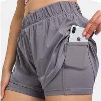 China Adjustable Waist High Stretchy Yoga Pocket Shorts Anti Glare Sports Pants Built - In Shorts for sale