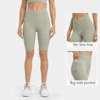 China Plus Size Casual Sports Yoga Pants Waist Cross Pockets Shorts Women Gym for sale
