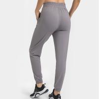 China Elastic Waist Yoga Sports Pockets Jogger Pants Women Workout Running Trouser for sale