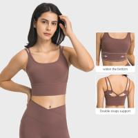 China Active Stretch Women Crop Tops Strappy Back Bulid In Widen Bottom Sports Bra for sale