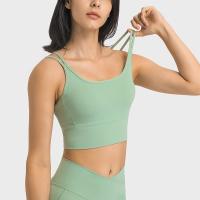 China Active Stretch Women Crop Tops Strappy Back Bulid In Widen Bottom Sports Bra for sale