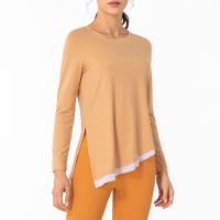 China Orange Nude Yoga Long Sleeve Top Women'S Irregular Breathable Sports T - Shirt for sale