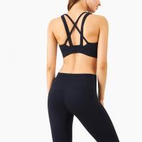 China Criss Cross Back Padded Strap Sports Bras For Women Yoga Fitness Tops for sale