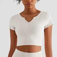 China Short Sleeve Padded V Neck Athletic Crop Tops Built In Bra Shirts for sale
