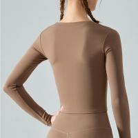China Breathable Comfortable Ladies Sports Shirt Autumn Winter Nude Yoga Long Sleeve Round Neck for sale