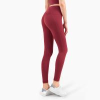 China Sturdy Pocket Yoga Pants Without T - Line Sports Nude Feeling High Waist Tight Leggings for sale