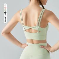 China Twist Hollow Out Yoga Underwear Fitness Vest Women'S Removable Bra for sale