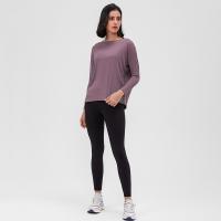 China Nylon Nude Feel Ladies Yoga Tops Workout Fashion Loose Women Long Sleeve Shirts for sale
