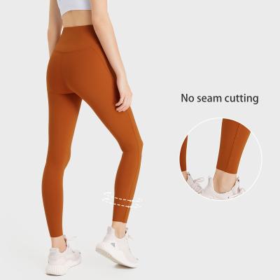 China Solid Color High Elasticity Pocket Yoga Pants Naked Feeling Sports Leggings for sale