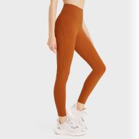 China Solid Color High Elasticity Pocket Yoga Pants Naked Feeling Sports Leggings for sale