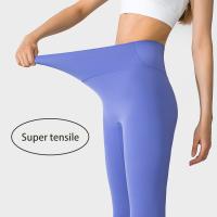 China Free Size Super Elastic Yoga Pants Hip Lifting Trackless Yoga Clothes Women for sale