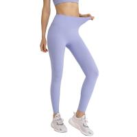 China Free Size Super Elastic Yoga Pants Hip Lifting Trackless Yoga Clothes Women for sale